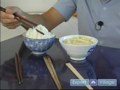 How to Use Chopsticks : Picking Up Rice With Chopsticks
