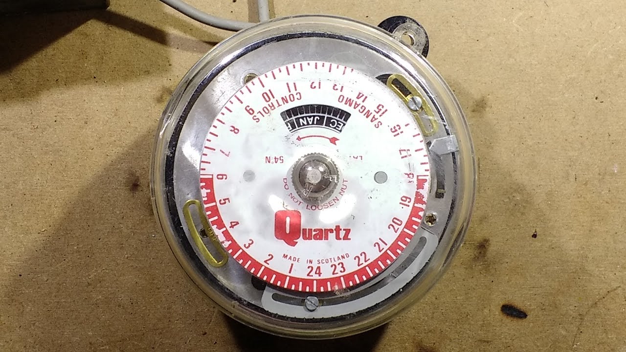 Fixing a Sangamo street lighting time switch with solar dial.